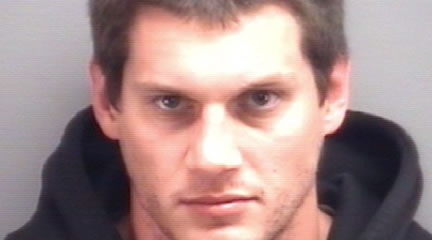 Man accused of assaulting Va. Beach police officer turns himself in ...
